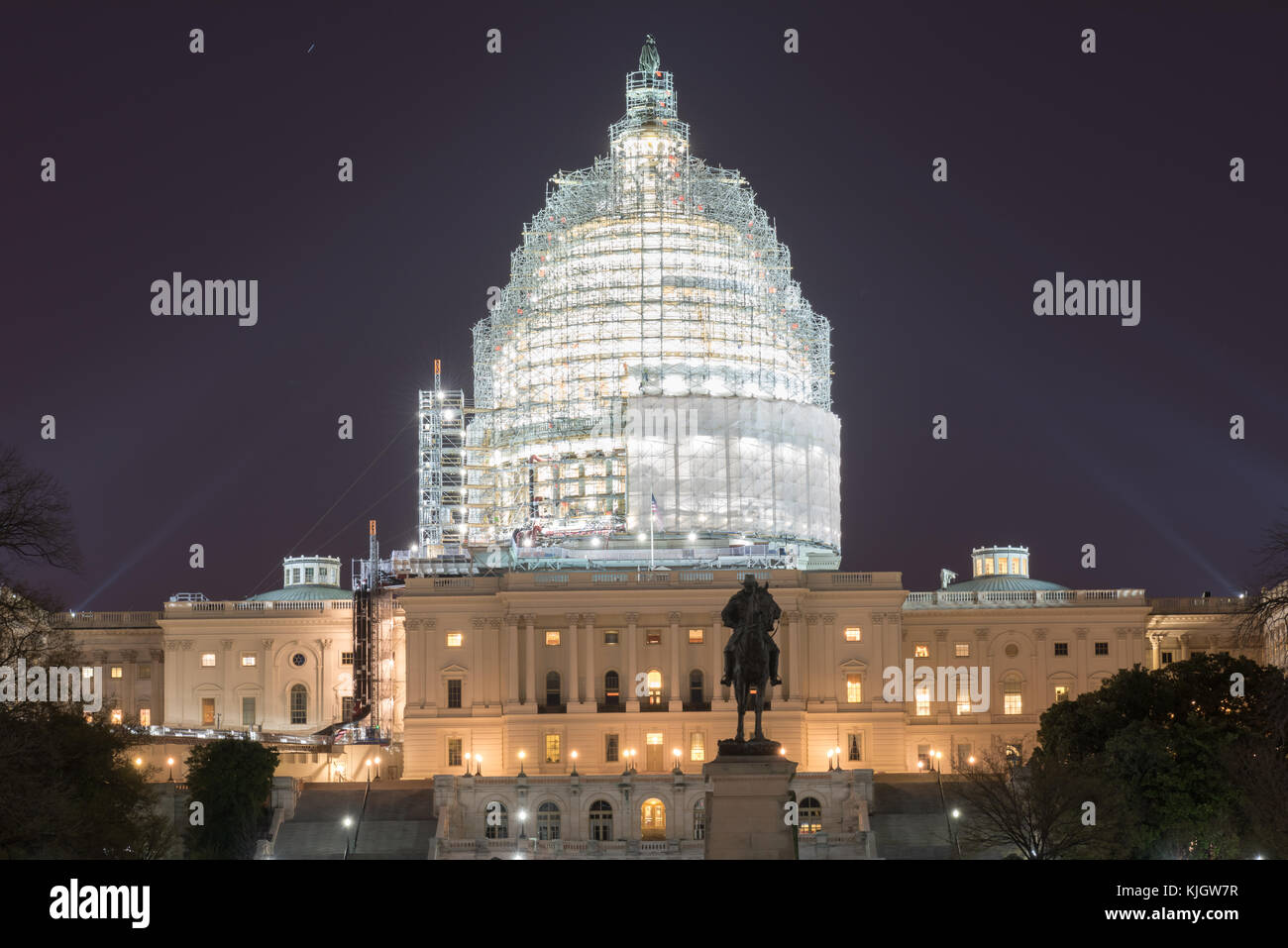 The Capitol Building of the United States of America at night with the ...