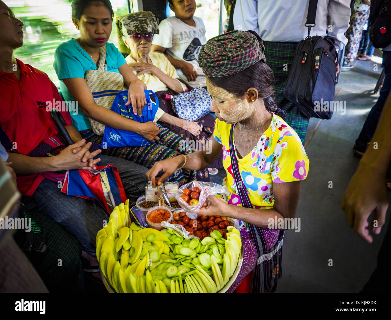 Yangon, Yangon Region, Myanmar. 25th Nov, 2017. A woman sells green ...