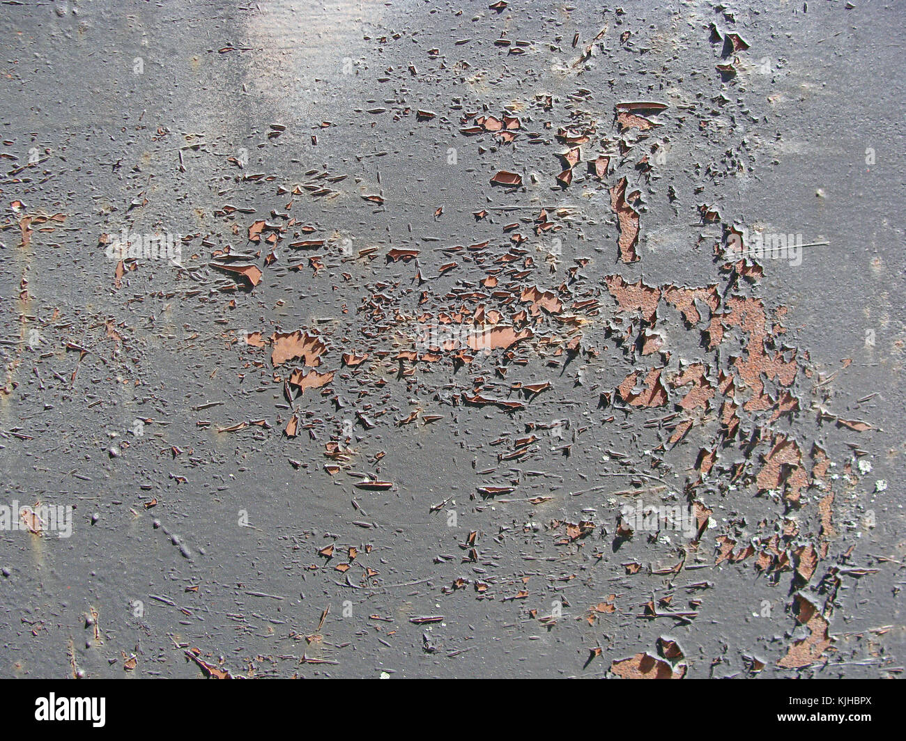 Brown rusty metal sheet with peeling black paint surface texture for ...