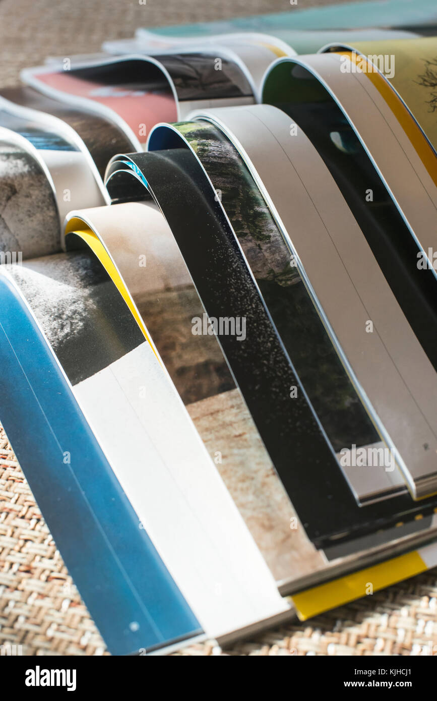 Many opened journals. Sun light Stock Photo - Alamy