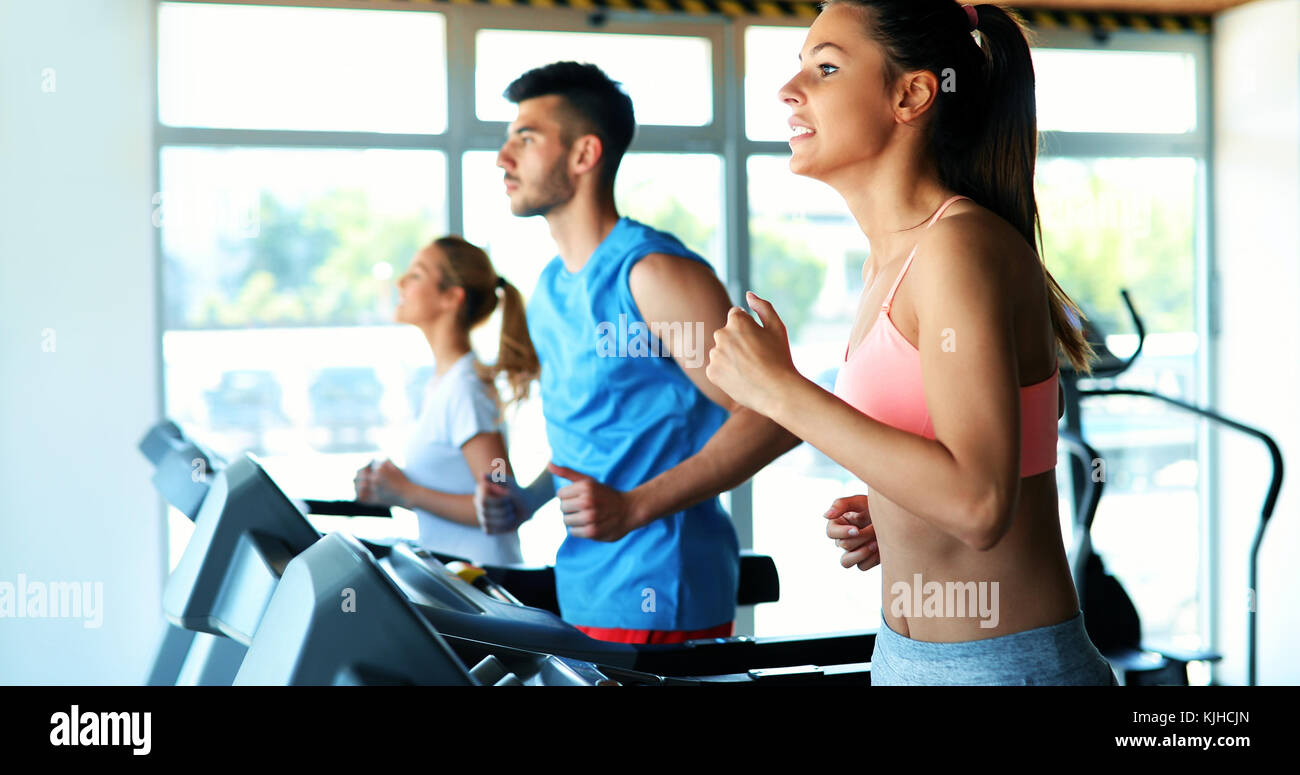 Picture of people running on treadmill in gym Stock Photo - Alamy