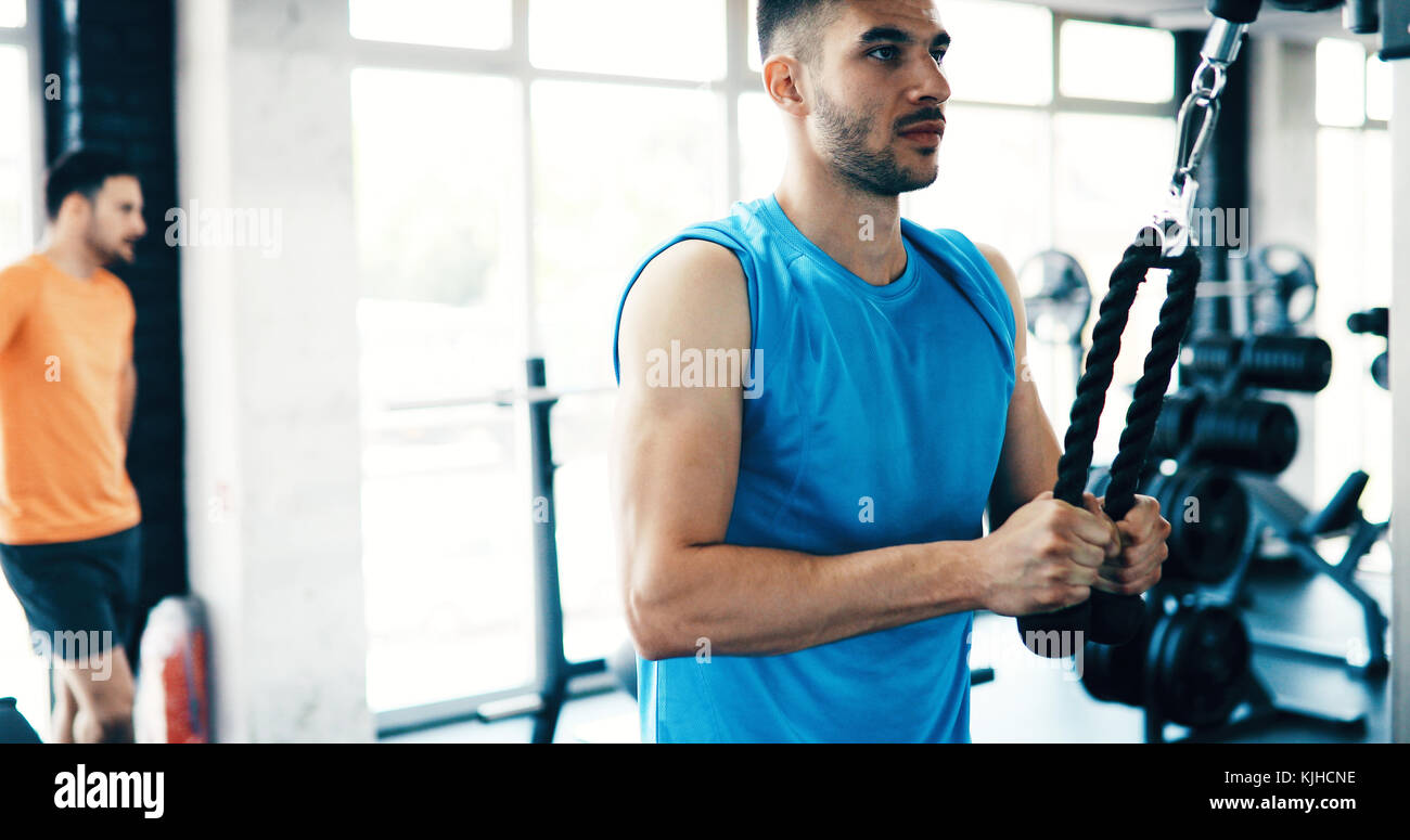 Portrait handsome bodybuilder doing exercise hi-res stock photography ...