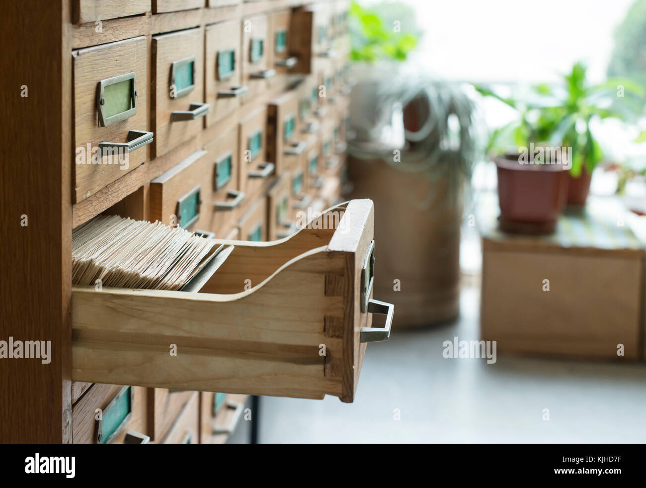 Old opened wooden drawers in archive Stock Photo - Alamy