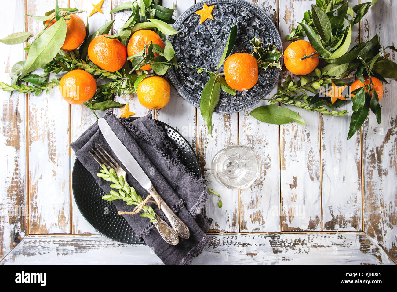 Christmas table decorations with clementines Stock Photo - Alamy
