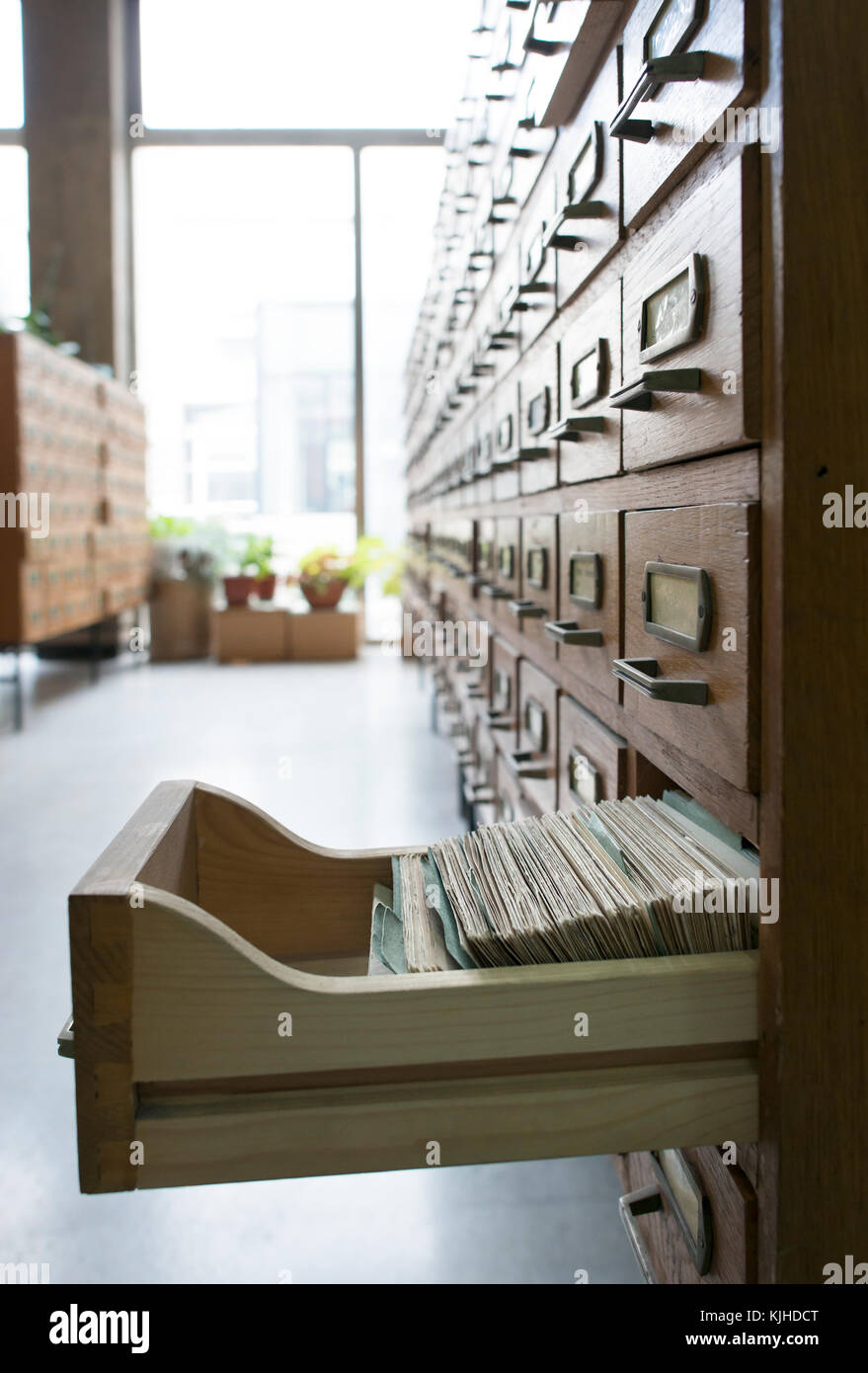 Old opened wooden drawers in archive Stock Photo - Alamy