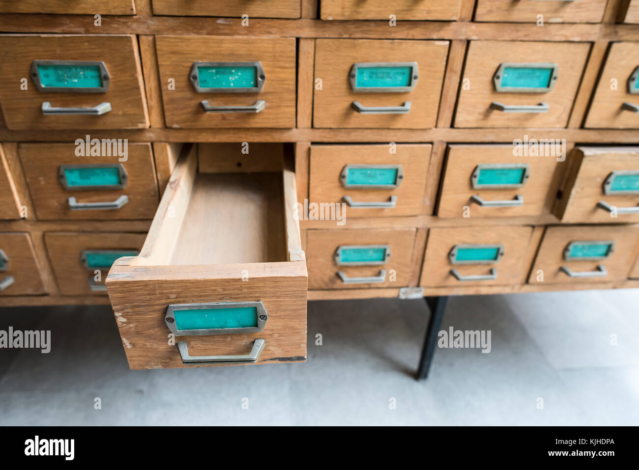 Drawers in archive. Wooden shelves Stock Photo - Alamy