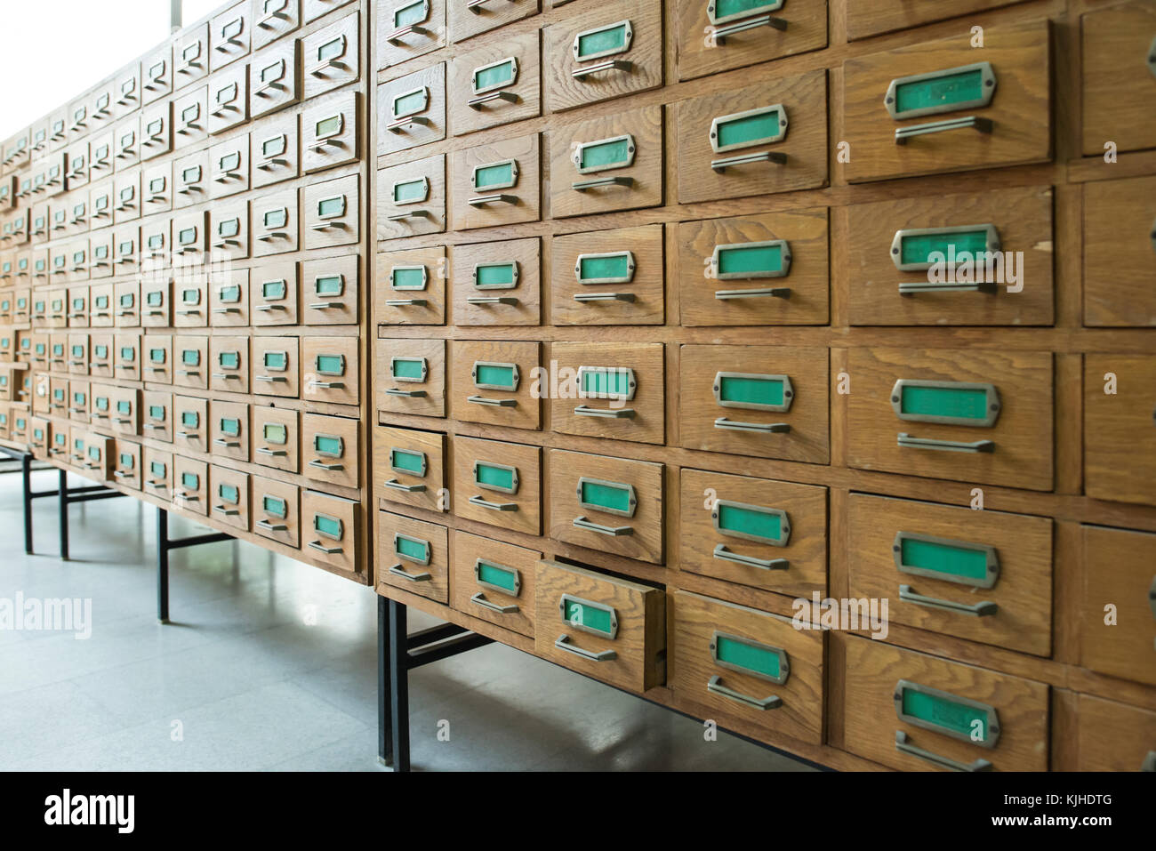 Drawers in archive. Wooden shelves Stock Photo - Alamy