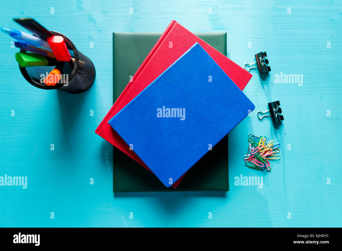 Back to school. Items for the school on a blue wooden table Stock Photo ...