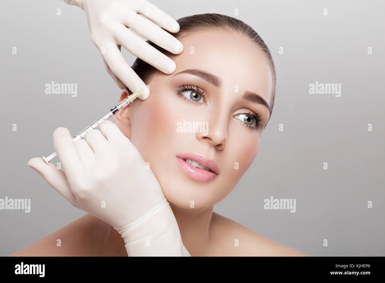 beautiful woman getting injection Stock Photo - Alamy