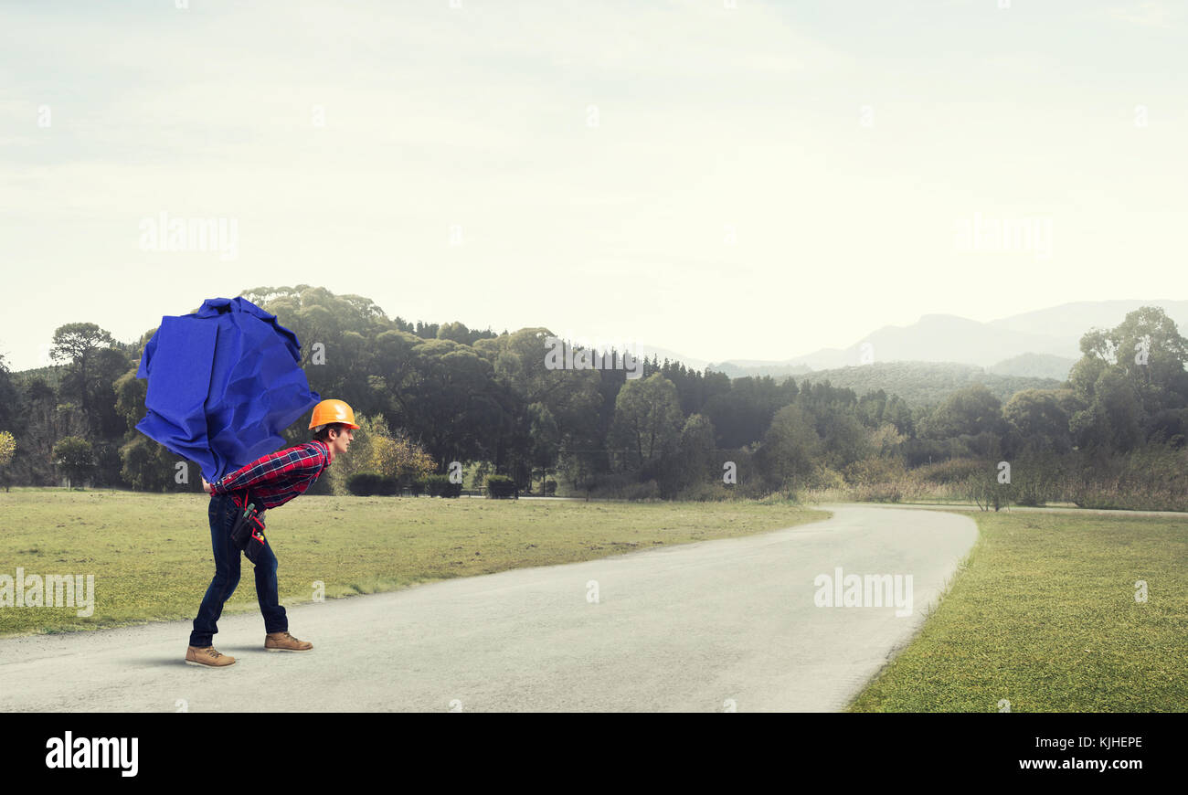 Engineer man carry load Stock Photo - Alamy