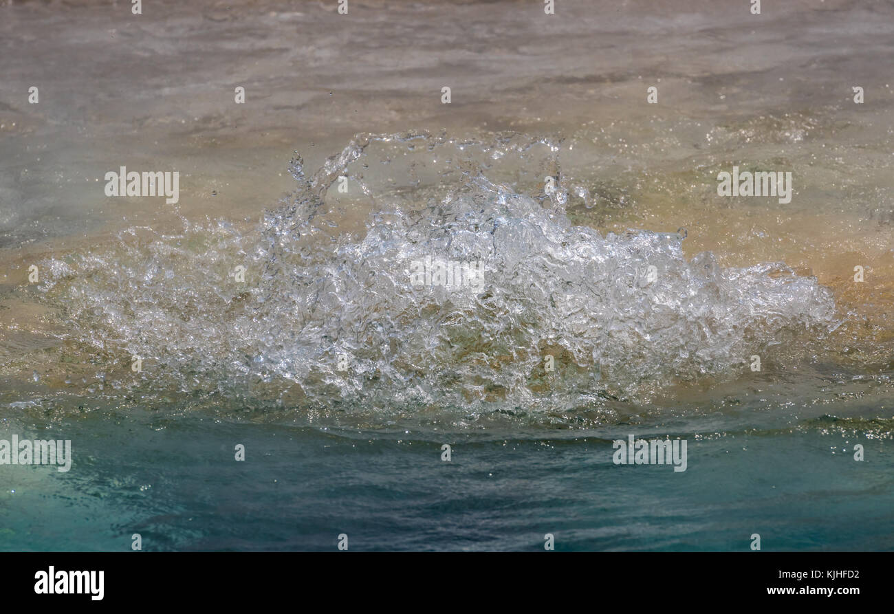 Water Bubbles Over from Heat of Volcano in Yellowstone Stock Photo - Alamy
