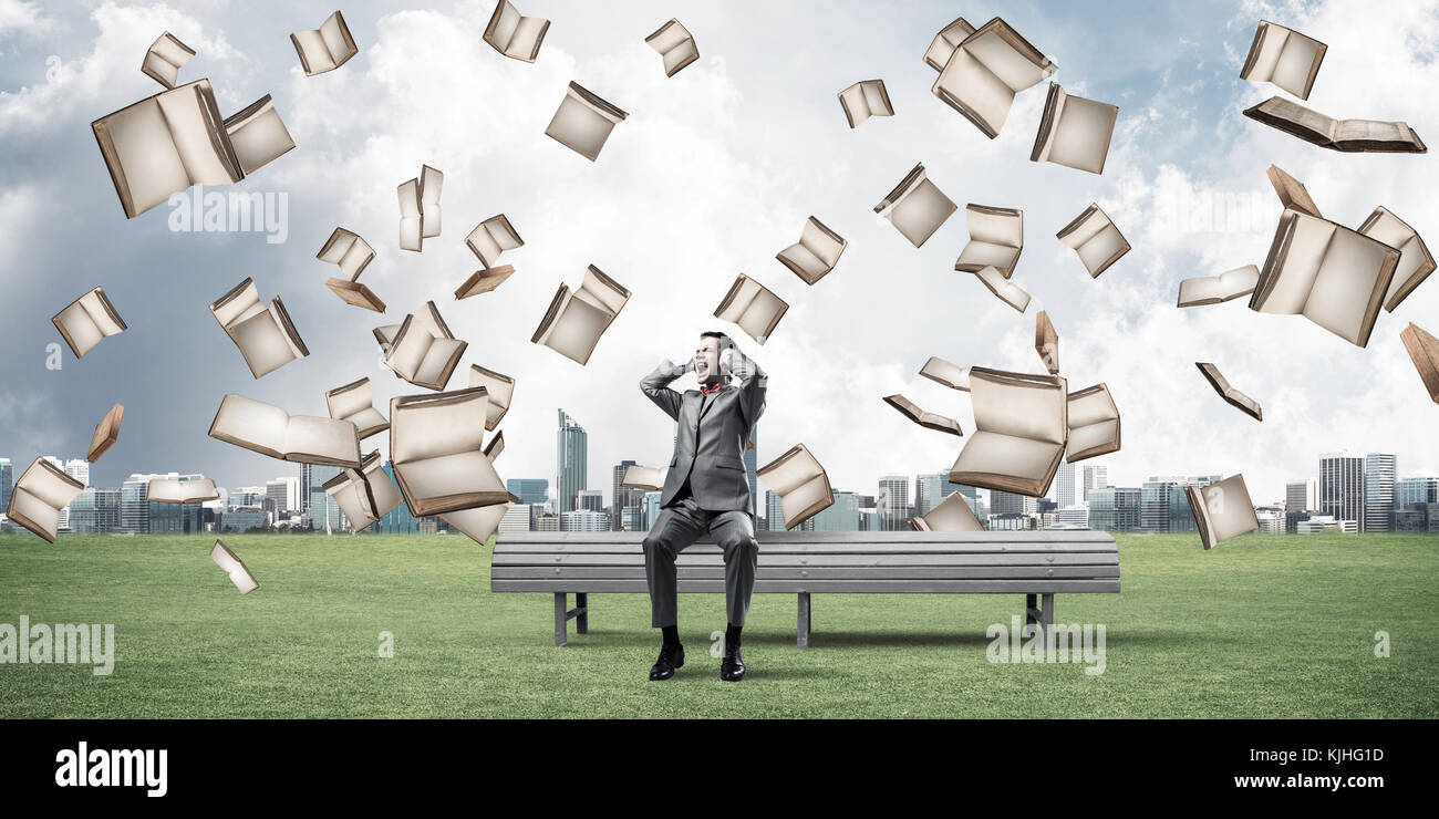 Book falling grass hi-res stock photography and images - Alamy
