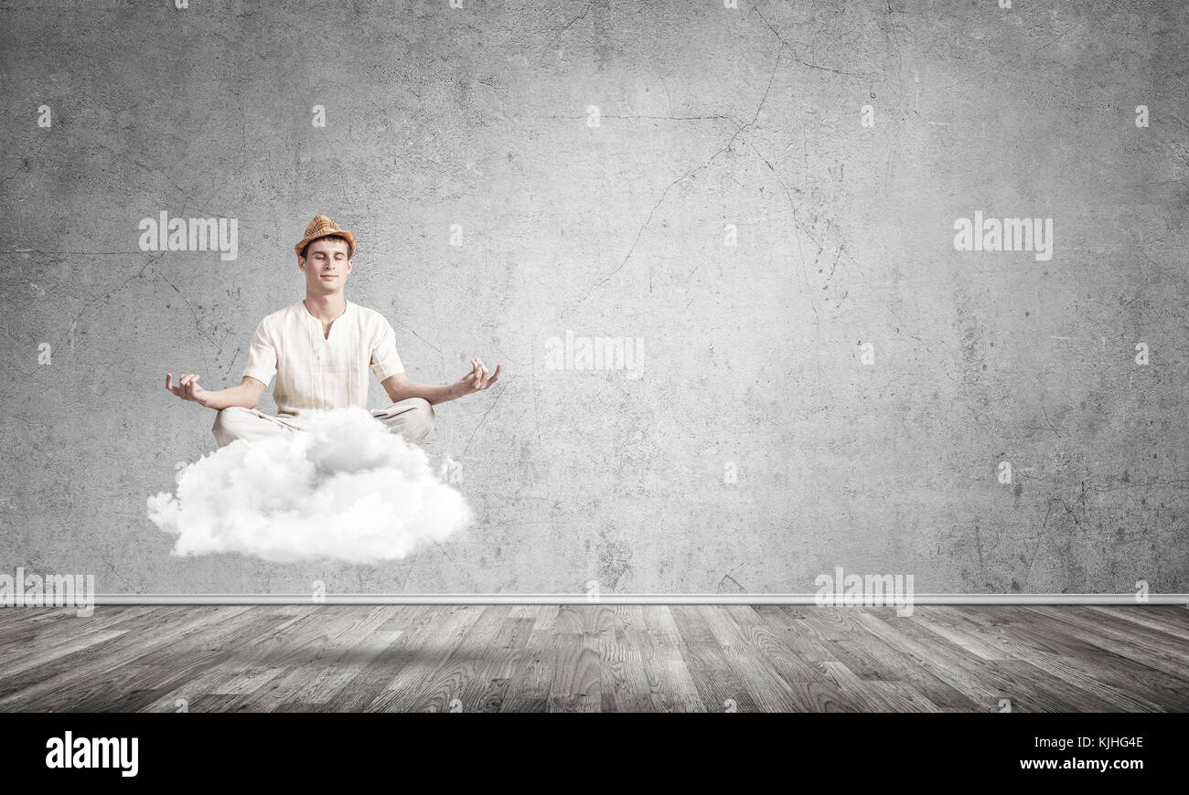 Young man keeping mind conscious Stock Photo - Alamy