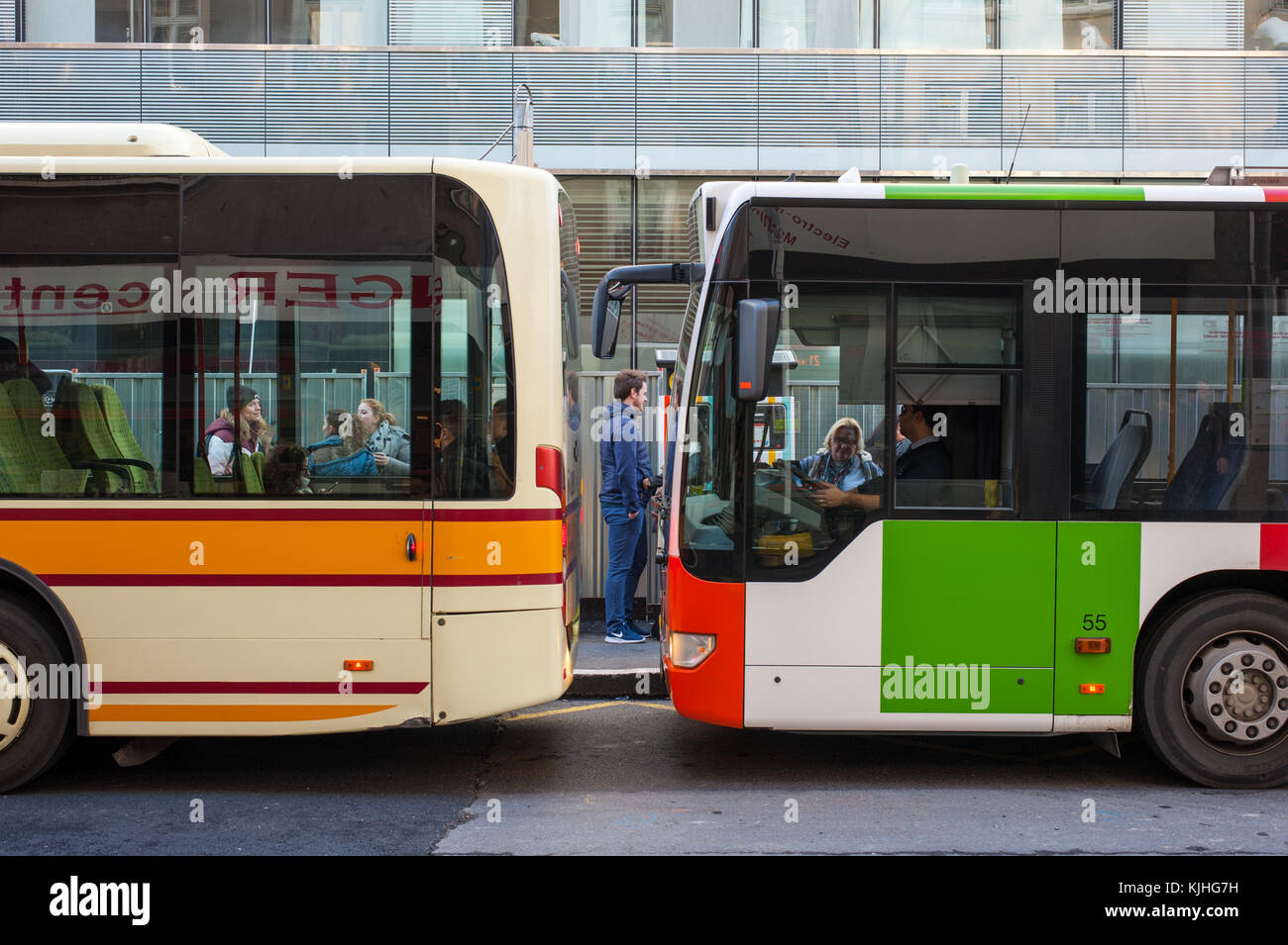 People waiting for a bus at a bus stop, Luxembourg City Stock Photo - Alamy