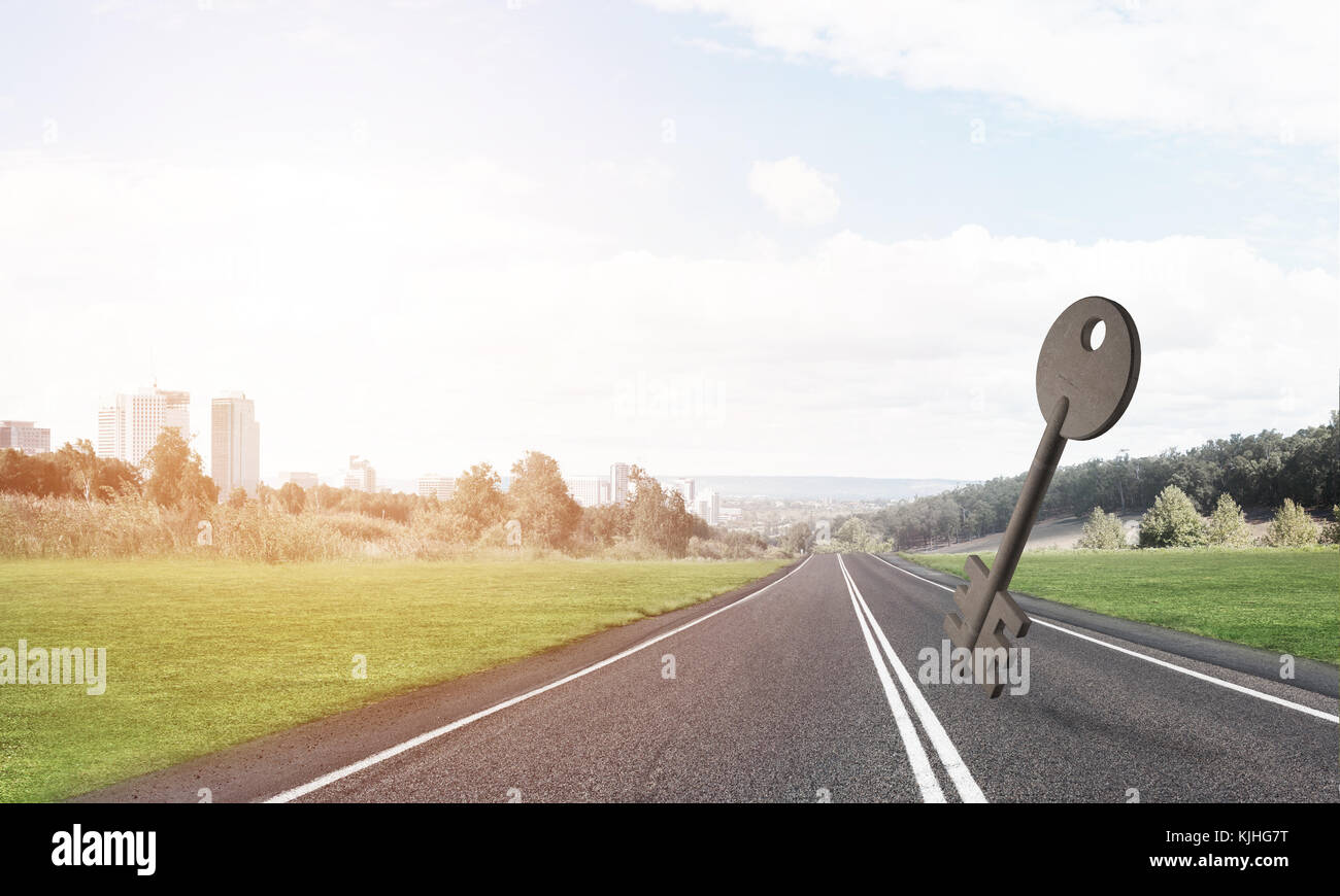 Conceptual background image of concrete key sign on asphalt road Stock ...