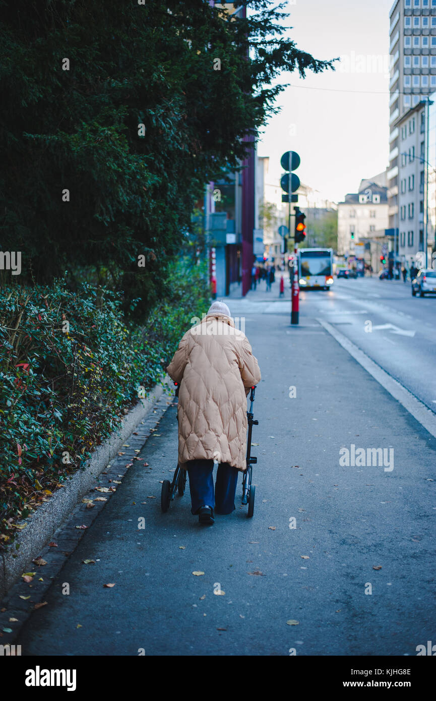 Old lady walker hi-res stock photography and images - Alamy