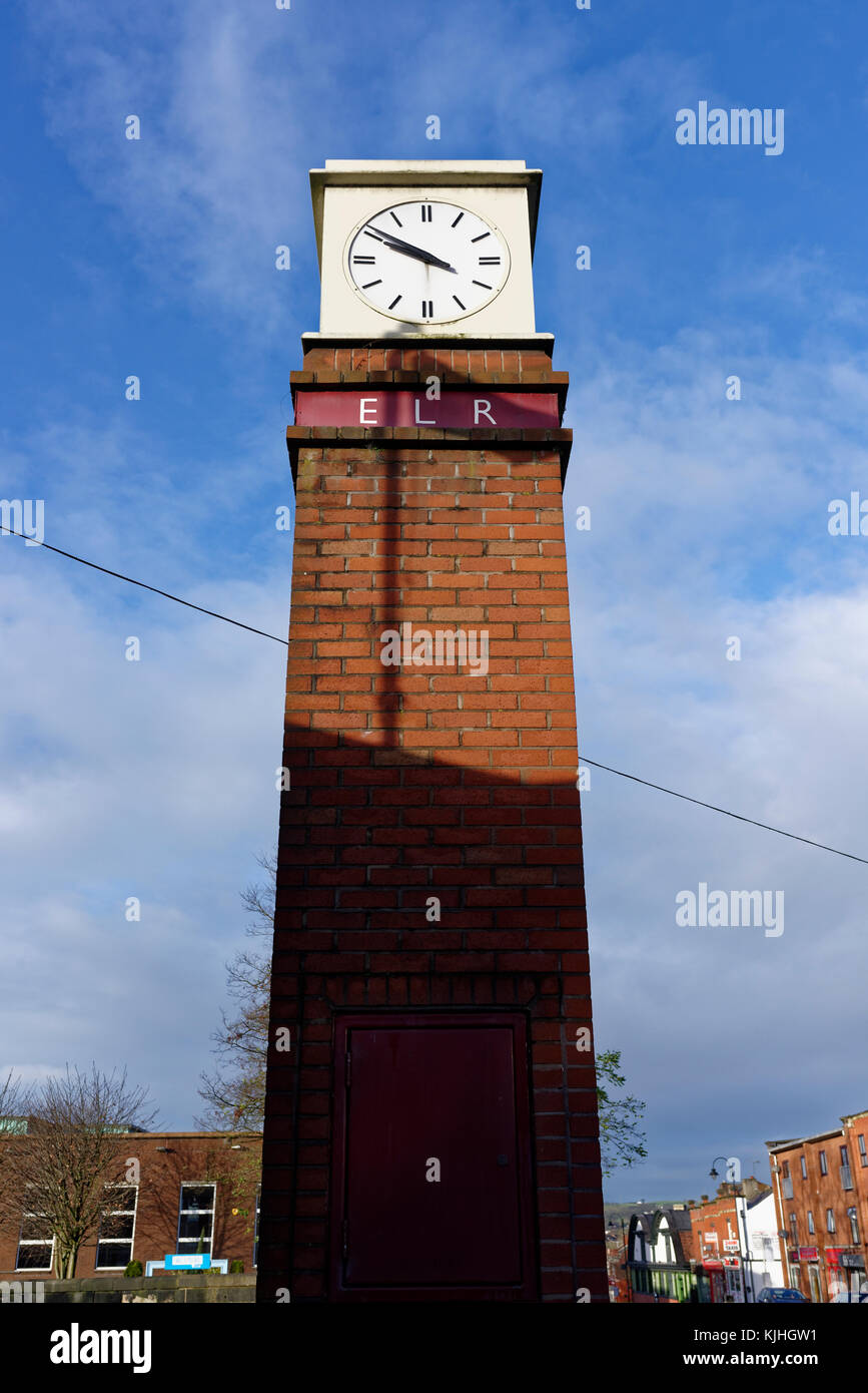 Clock tower with white face clock at ten minutes to ten, at east ...