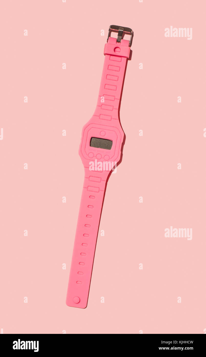 Bright pink colour clock Stock Photo - Alamy