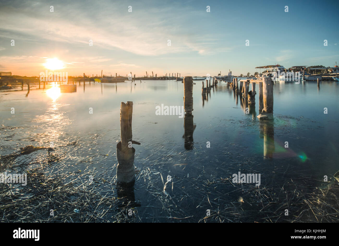 Beautiful sunset landscape with boats at the lagoon of Mesolongi ...