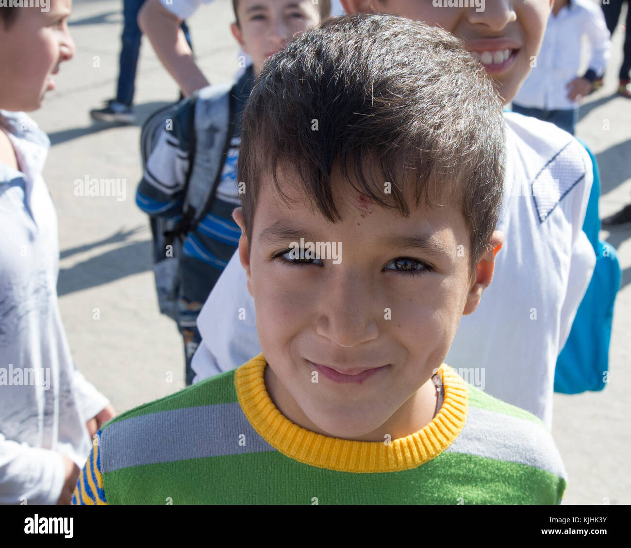 An Iraqi student poses for a photo at a primary school, Mosul Dam ...