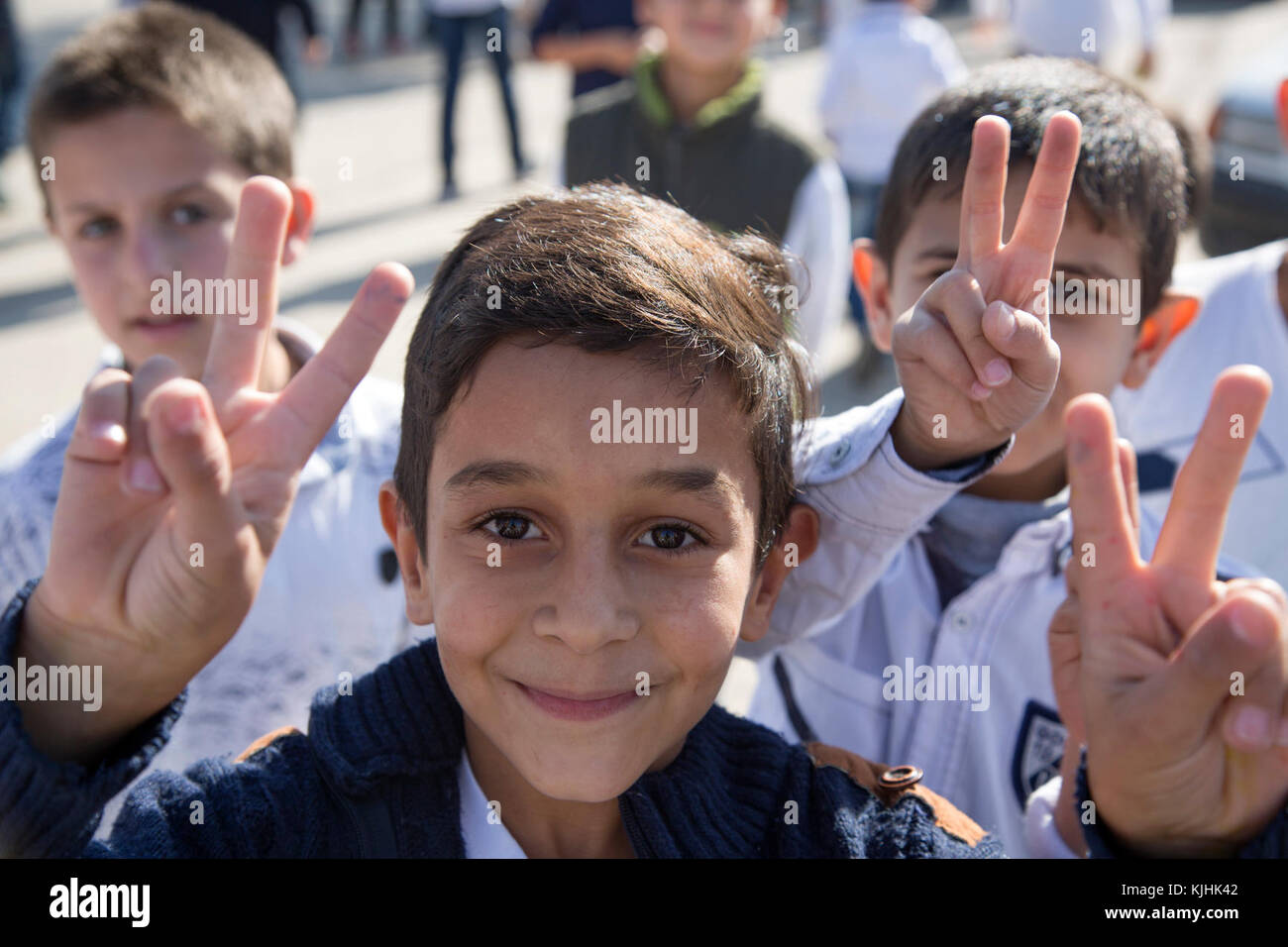 An Iraqi student poses for a photo at a primary school, Mosul Dam ...
