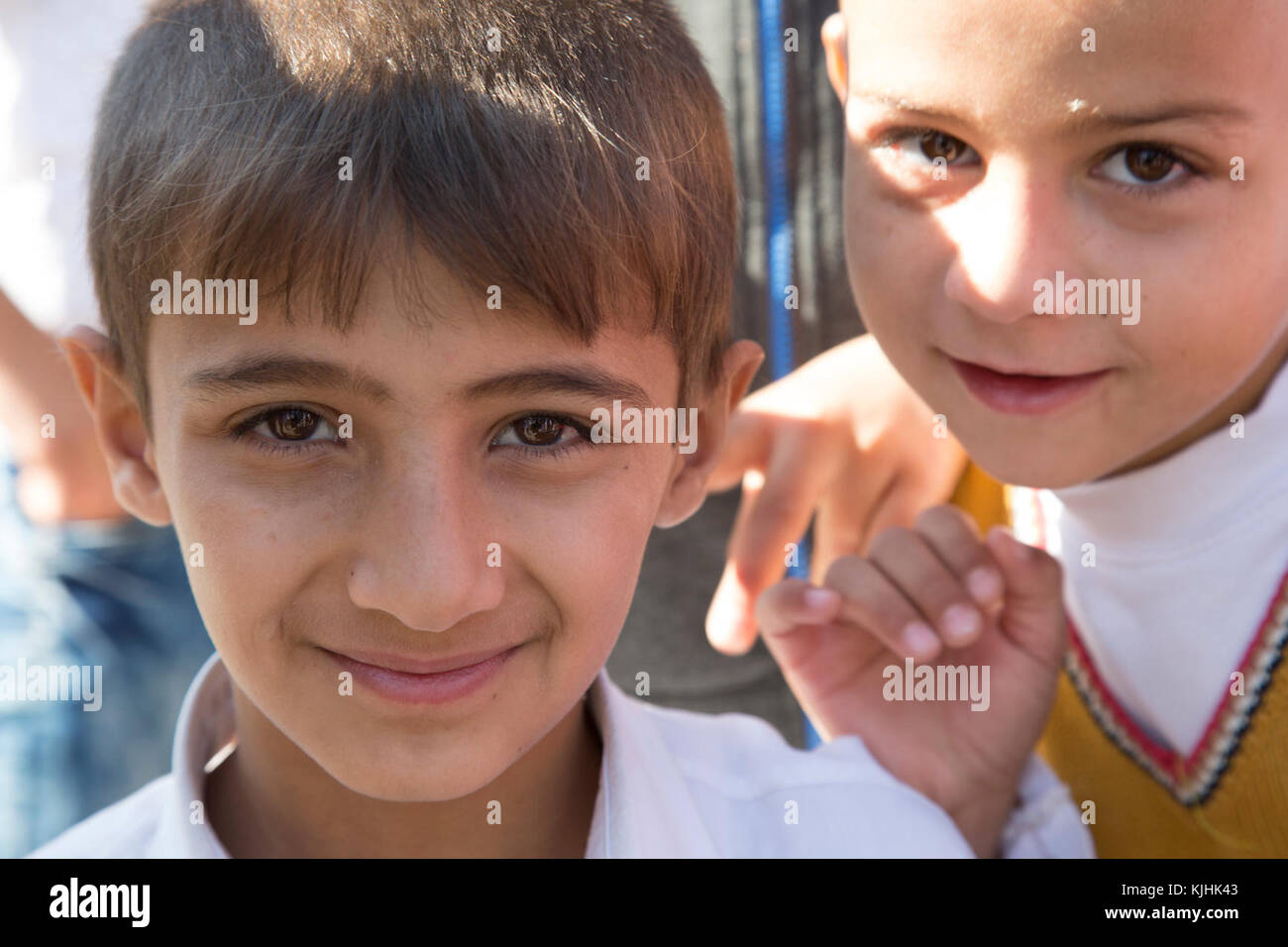 Iraqi students pose for a photo at a primary school, Mosul Dam Village ...