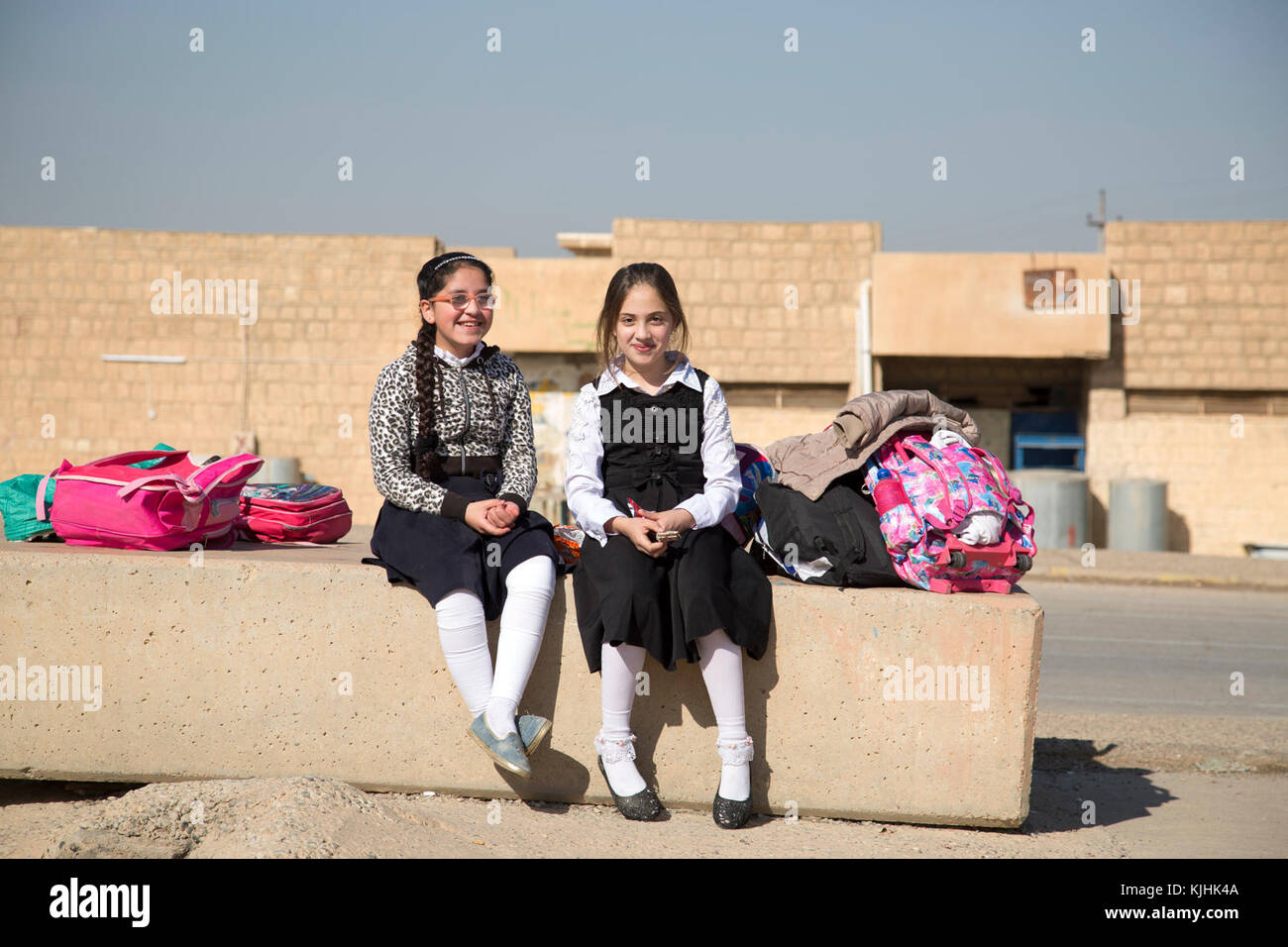Iraqi students pose for a photo at a primary school, Mosul Dam Village ...