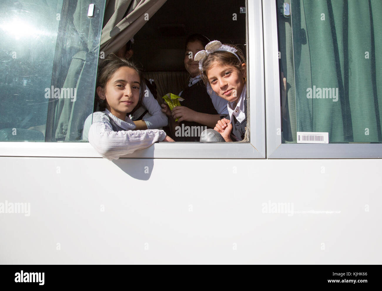 Iraqi students pose for a photo at a primary school, Mosul Dam Village ...
