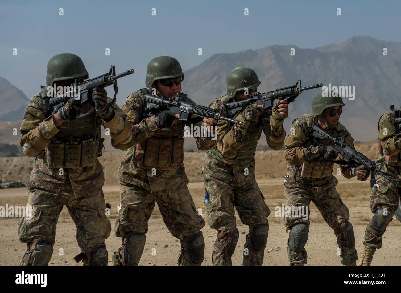 Afghan Commando trainees conduct reflexive fire drills during training ...