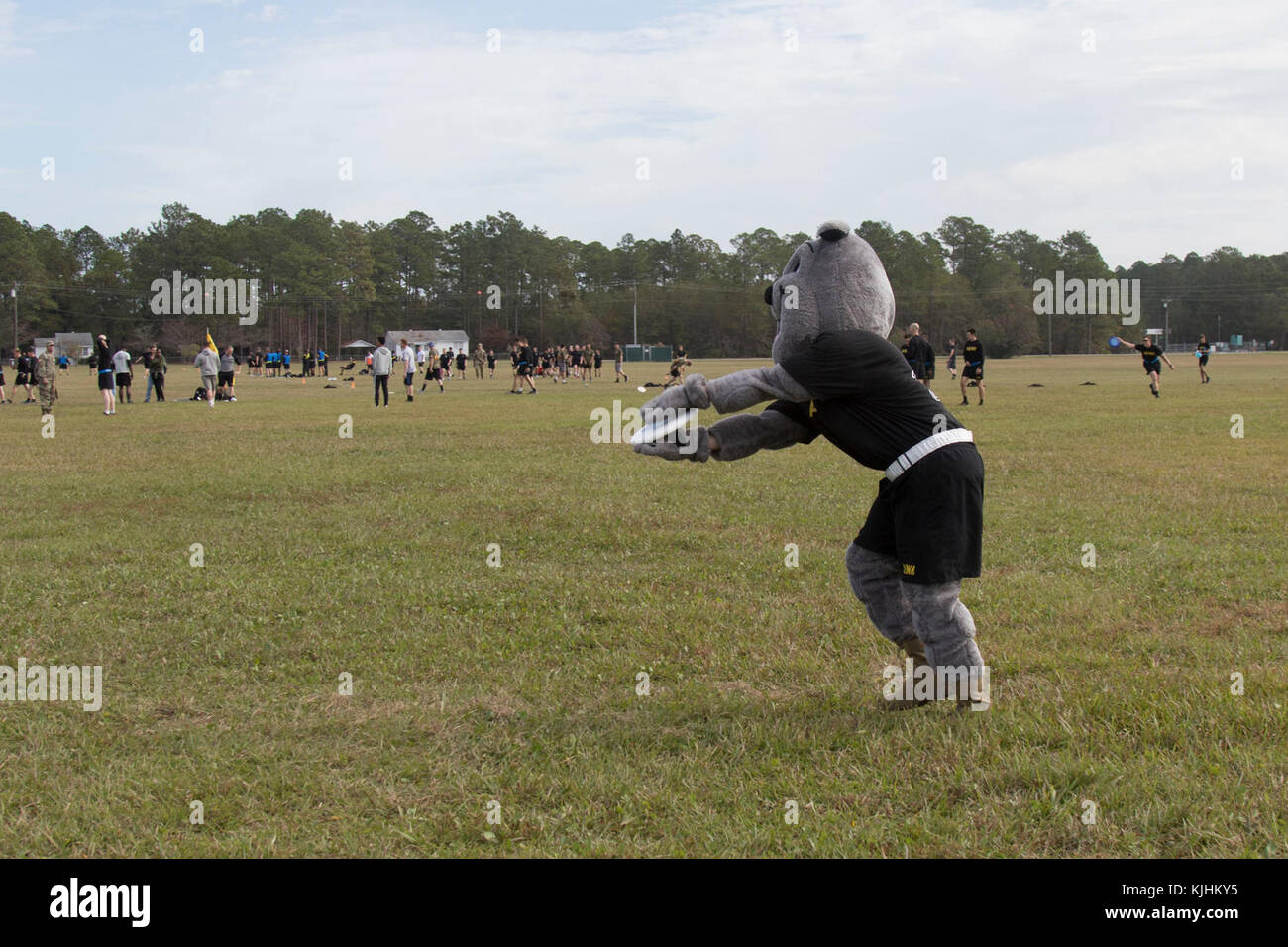Sgt. Rocky, 3rd Infantry Division's mascot, plays frisbee with Soldiers ...