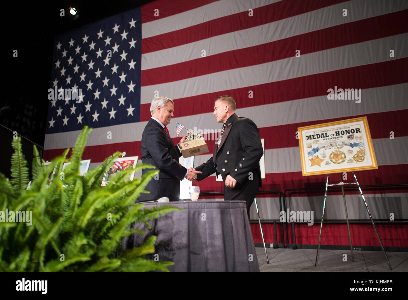 Mr. Tom Lyons, Founder and chairman of the Semper Fi Society, presents ...