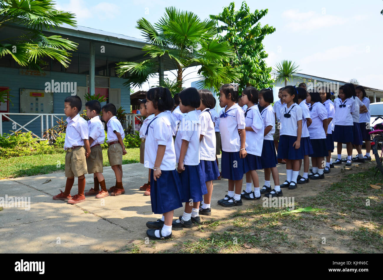 Thai children student line up at front of classroom building of Don ...