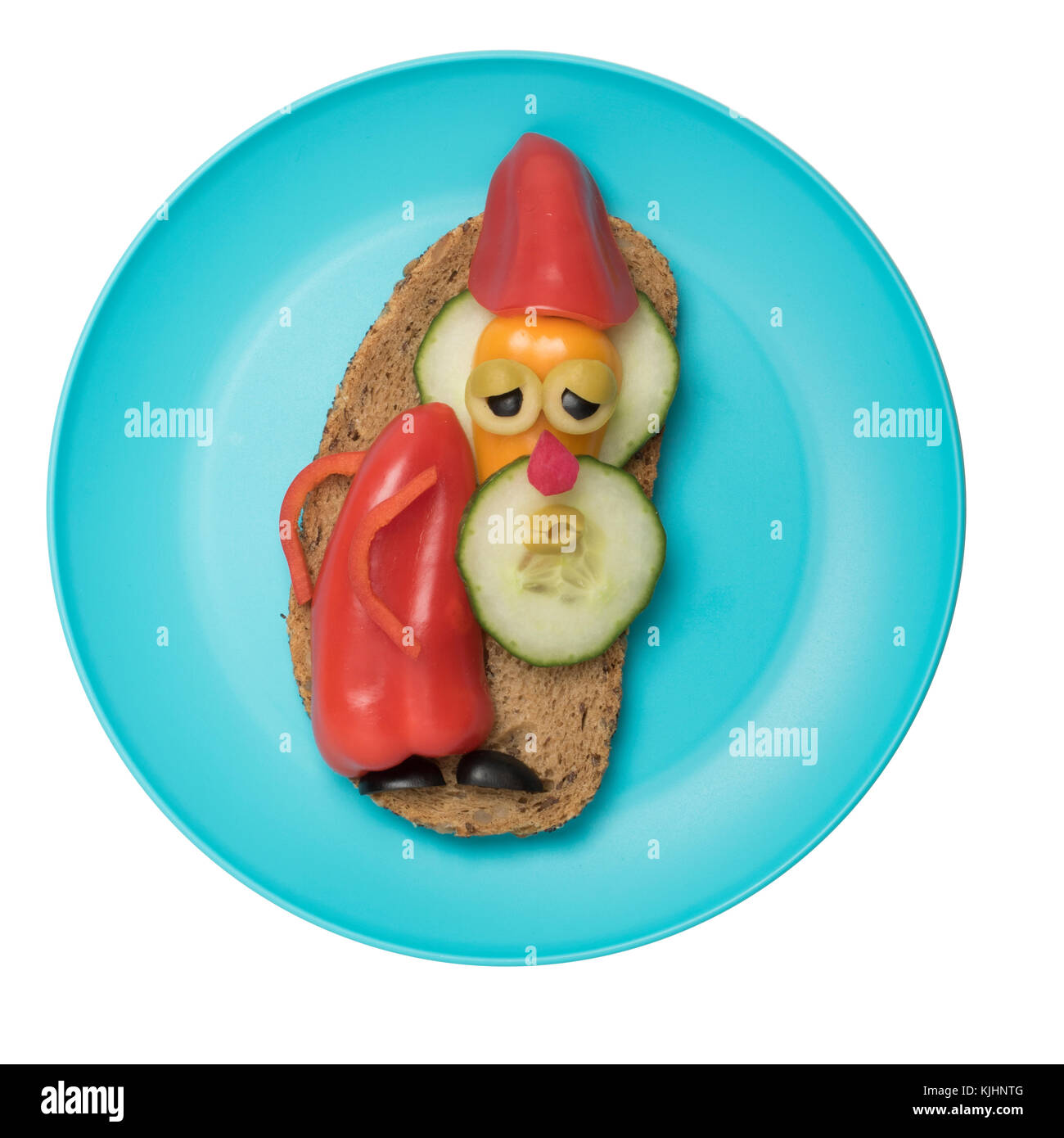 Santa Claus made with vegetables on bread and plate Stock Photo - Alamy