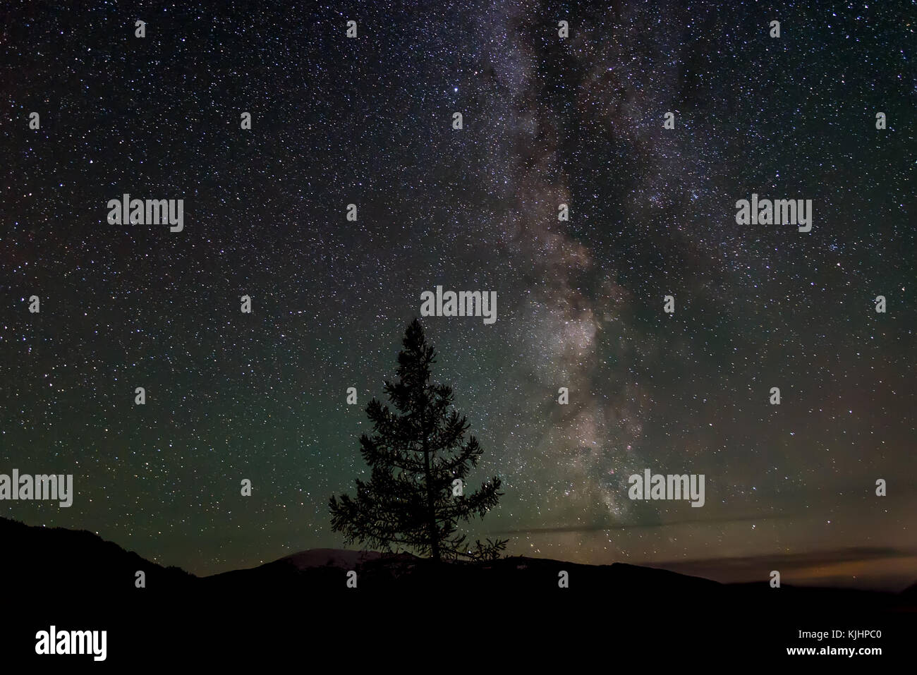 Beautiful night landscape with a galaxy Milky Way in a starry sky over ...