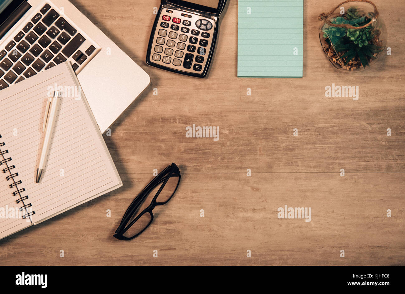 Wood office desk table with laptop and supplies, France Stock Photo - Alamy