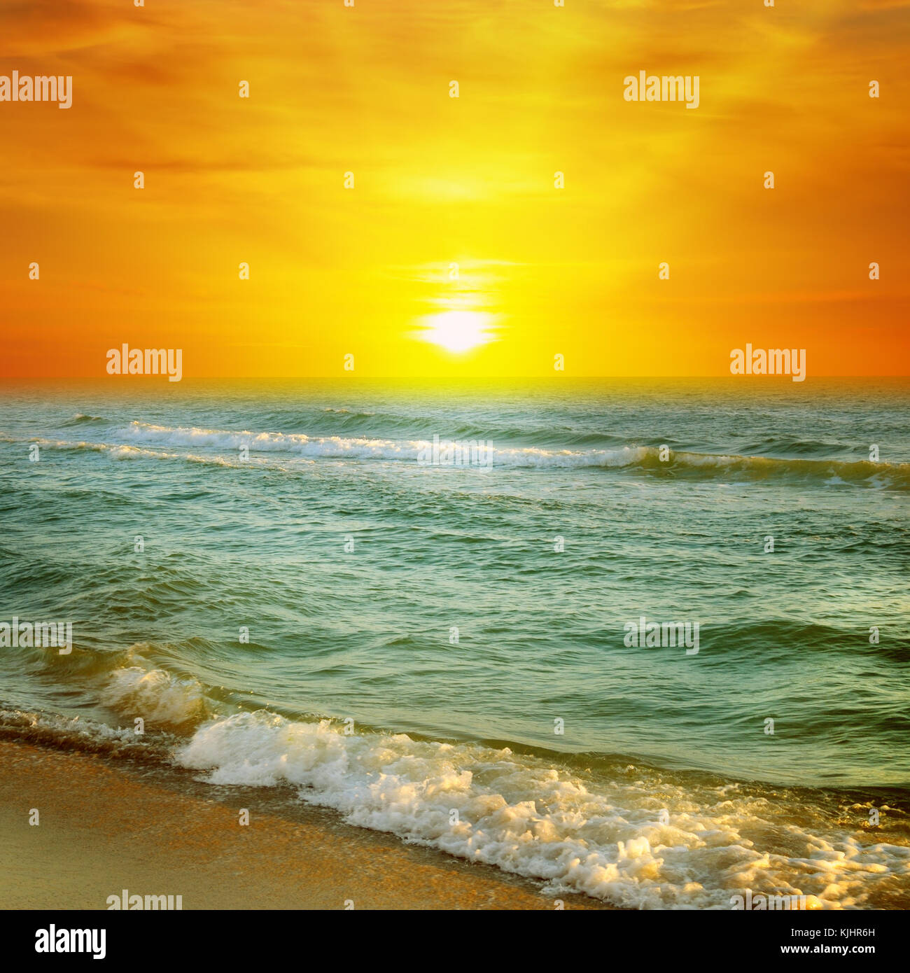 Fantastic sunrise on the ocean Stock Photo - Alamy