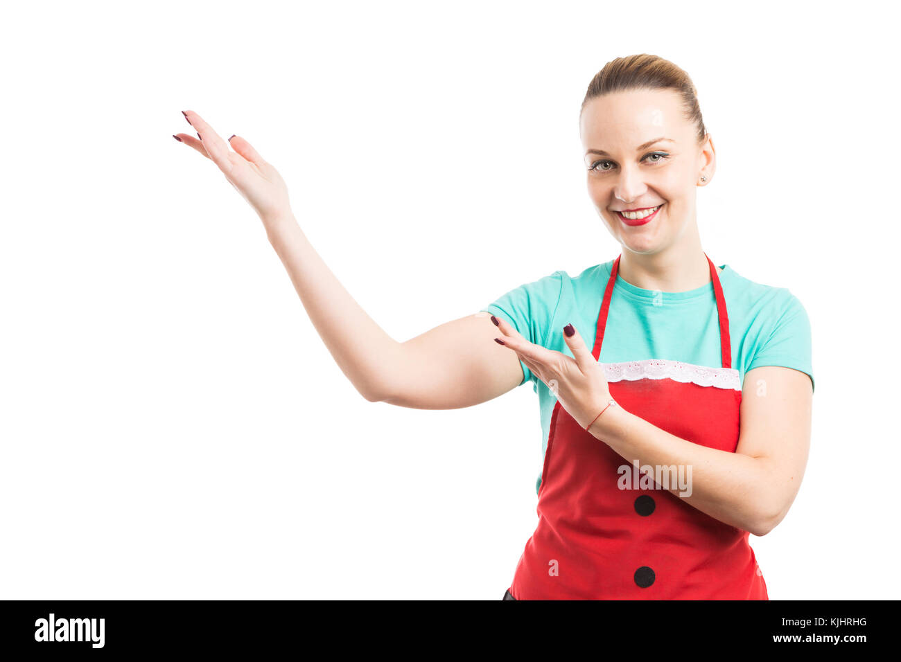 Woman wearing red apron showing or presenting copy space isolated on ...