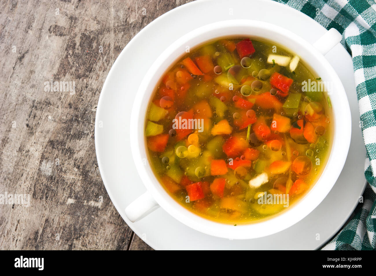 Vegetable soup in bowl on wooden table Stock Photo - Alamy