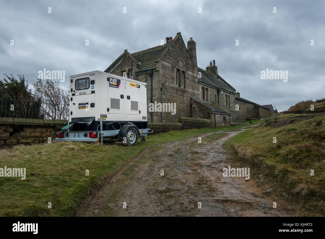 Cat Mobile Diesel Generator Set plugged in and running outside a rural ...