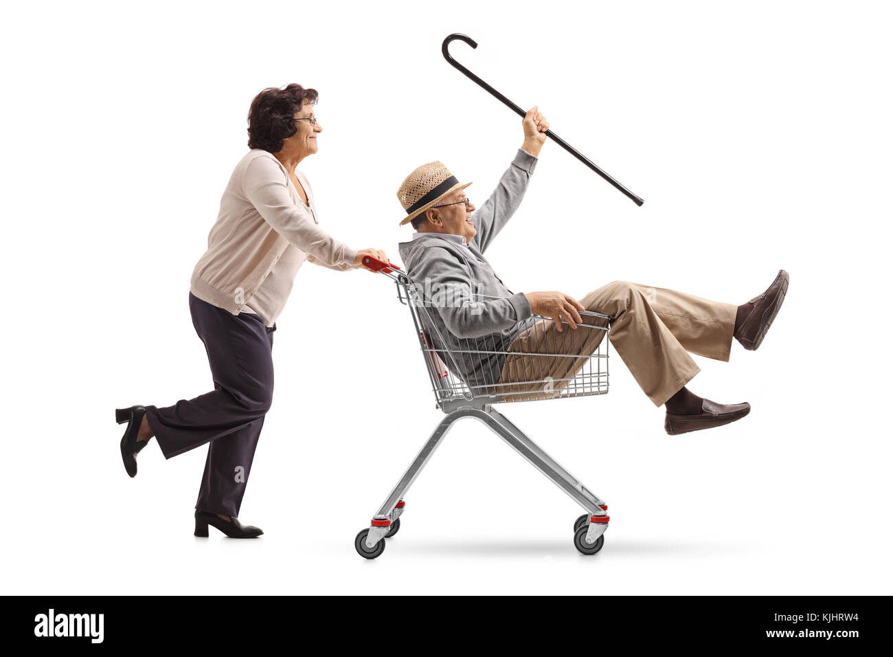 Old woman pushing shopping trolley hi-res stock photography and images ...