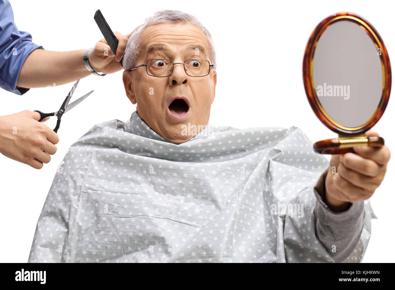 Shocked mature man having a haircut and looking at himself in a mirror ...