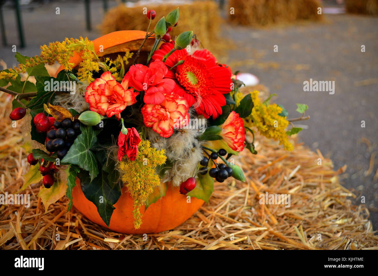 Colorful autumn flower bouquet on haystack Stock Photo - Alamy