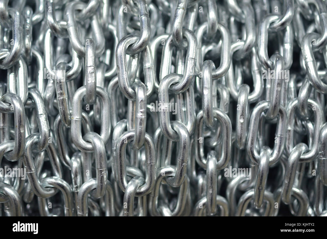 A ball of shiny metal chain of large links Stock Photo - Alamy