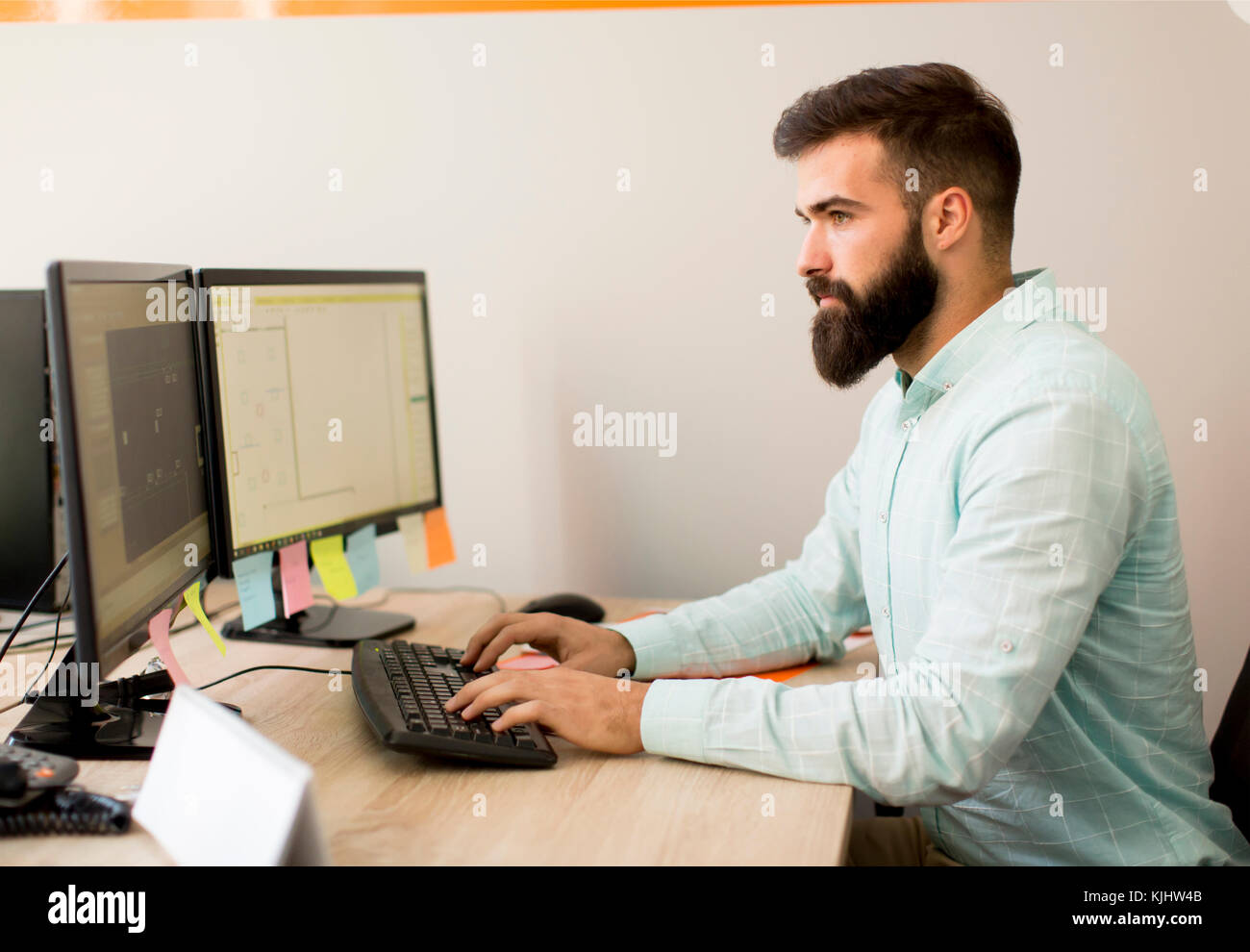 Man working on pc hi-res stock photography and images - Alamy