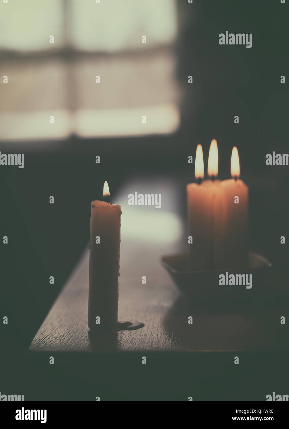 Candles on a table Stock Photo - Alamy