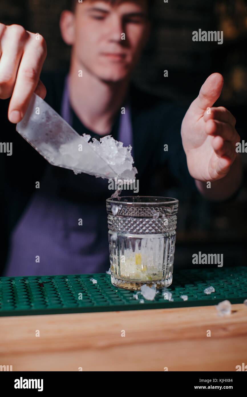 Person pouring ice cubes glass hi-res stock photography and images - Alamy
