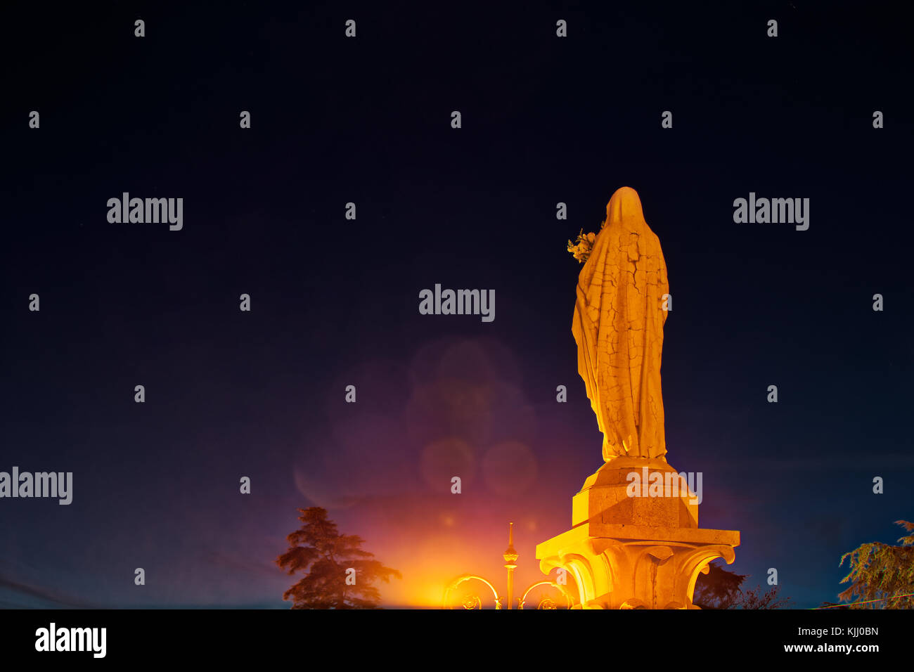 night view of statue of the Blessed Virgin Mary at night Stock Photo ...