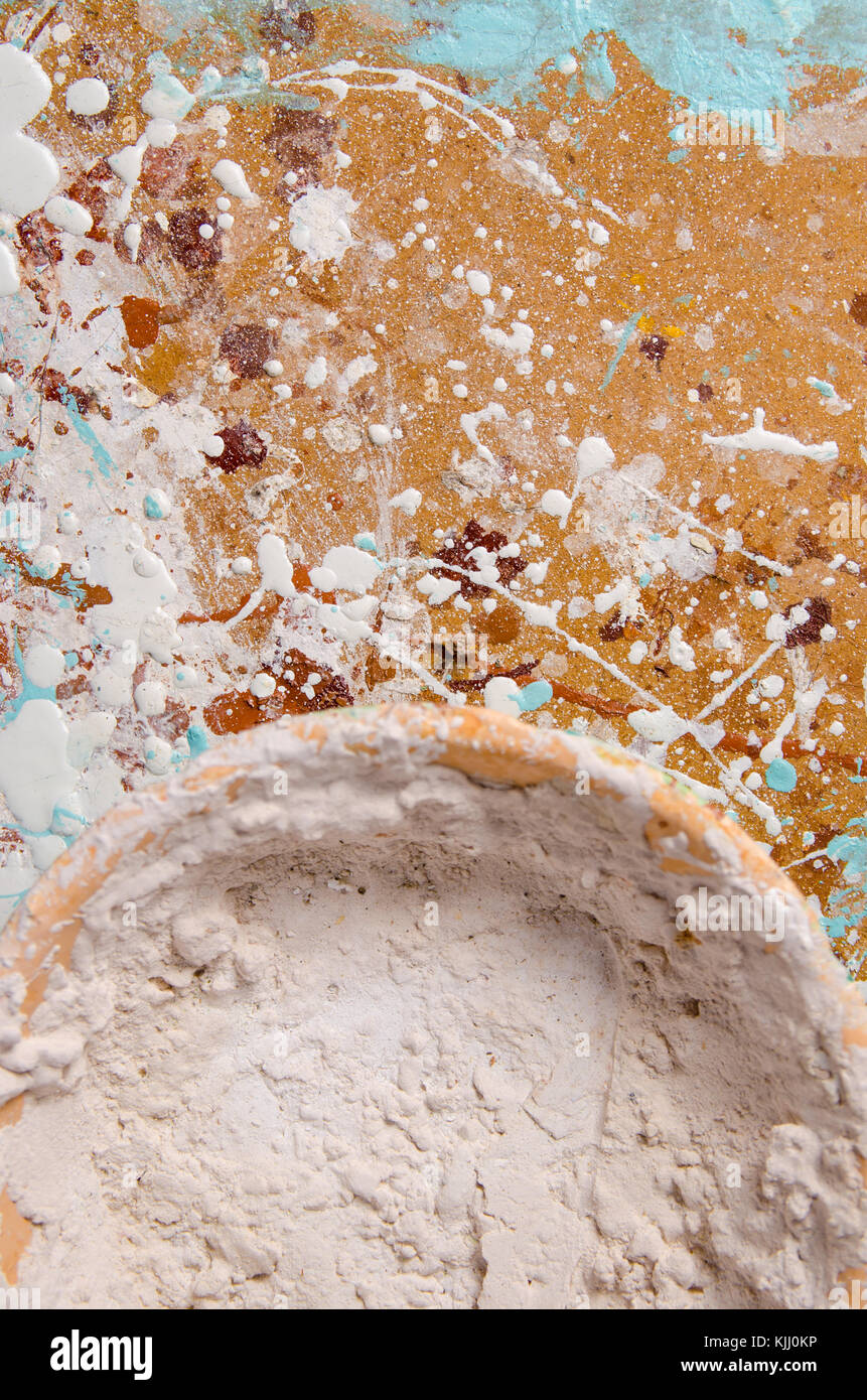 A bowl with dried putty on the background of hardboard Stock Photo - Alamy