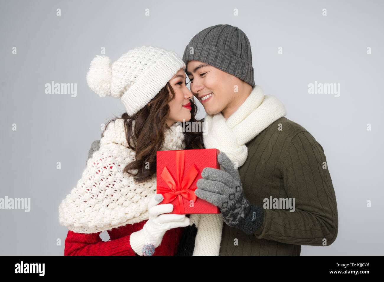 Red sweaters hi-res stock photography and images - Alamy