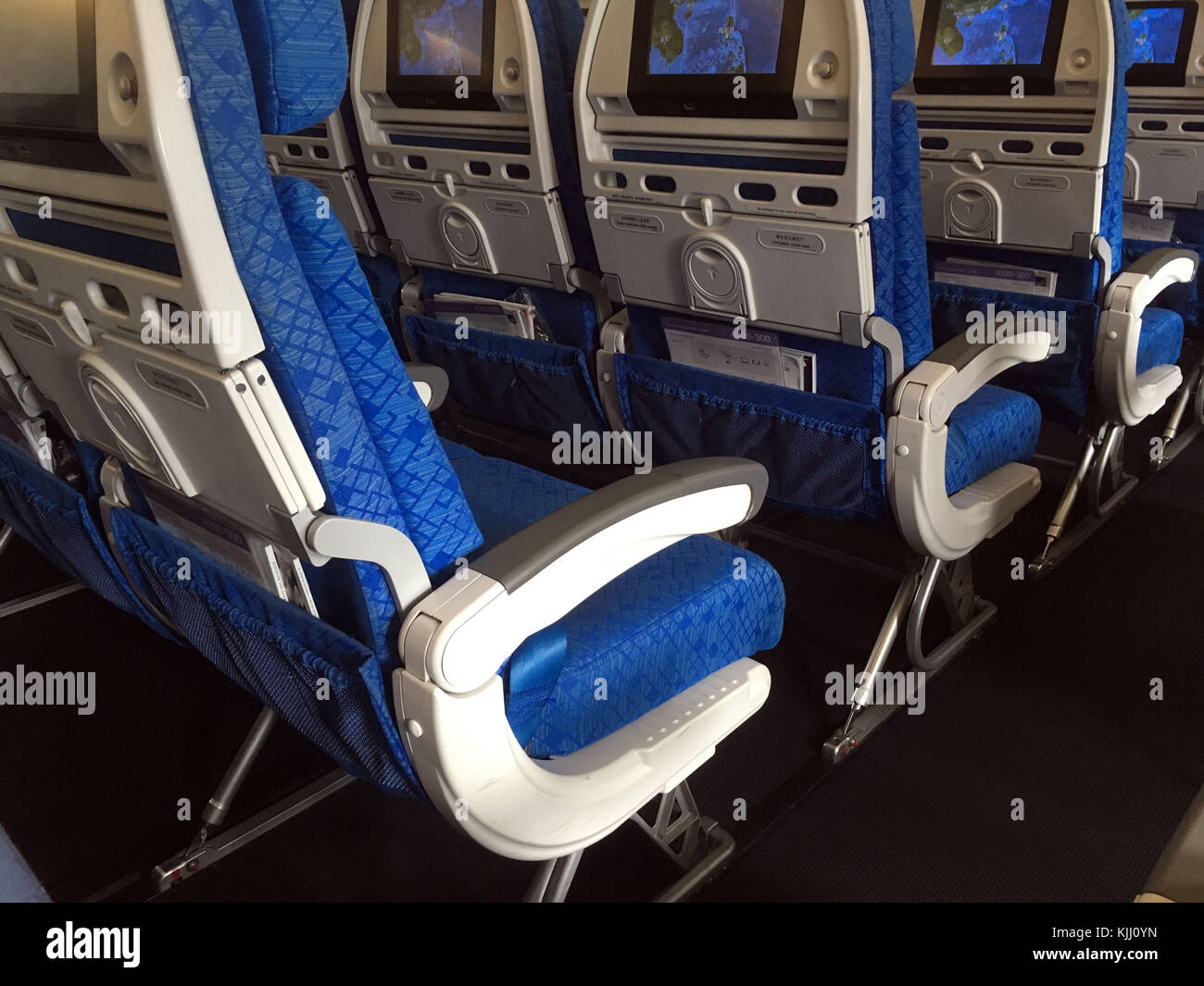 Cabin seats in an airplane Stock Photo - Alamy